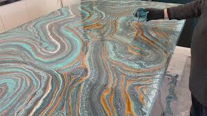 Epoxy Plus Dirty Pour Technique Done on Wooden Surface